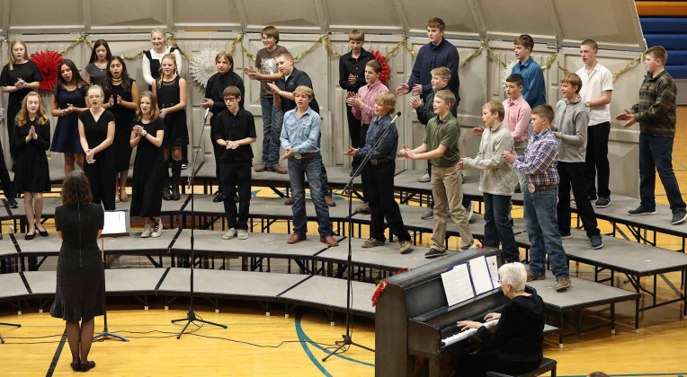 Students raise holiday spirit and voices in song at winter concerts ...